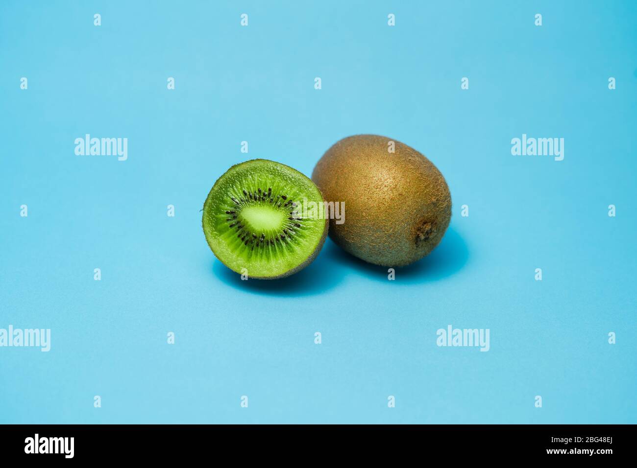 Close-up Kiwi fruit in the Blue background Stock Photo - Alamy