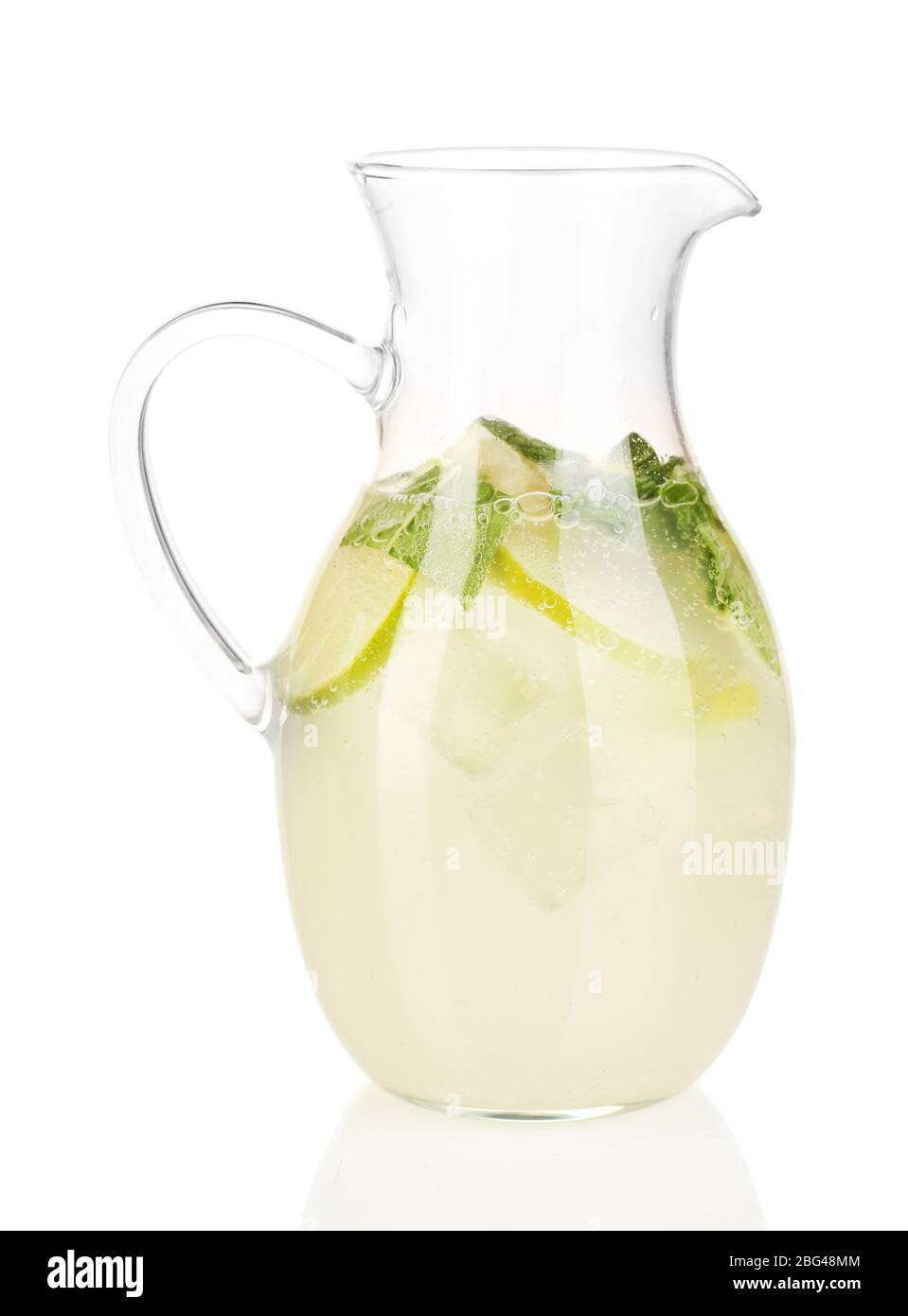 Lemonade in pitcher isolated on white Stock Photo - Alamy
