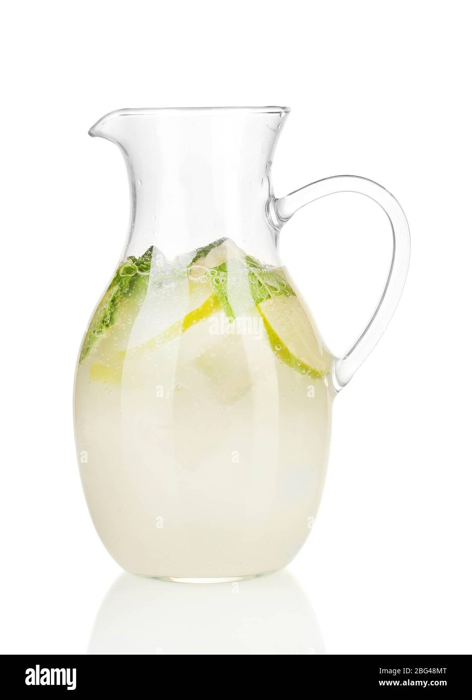 Lemonade in pitcher isolated on white Stock Photo - Alamy