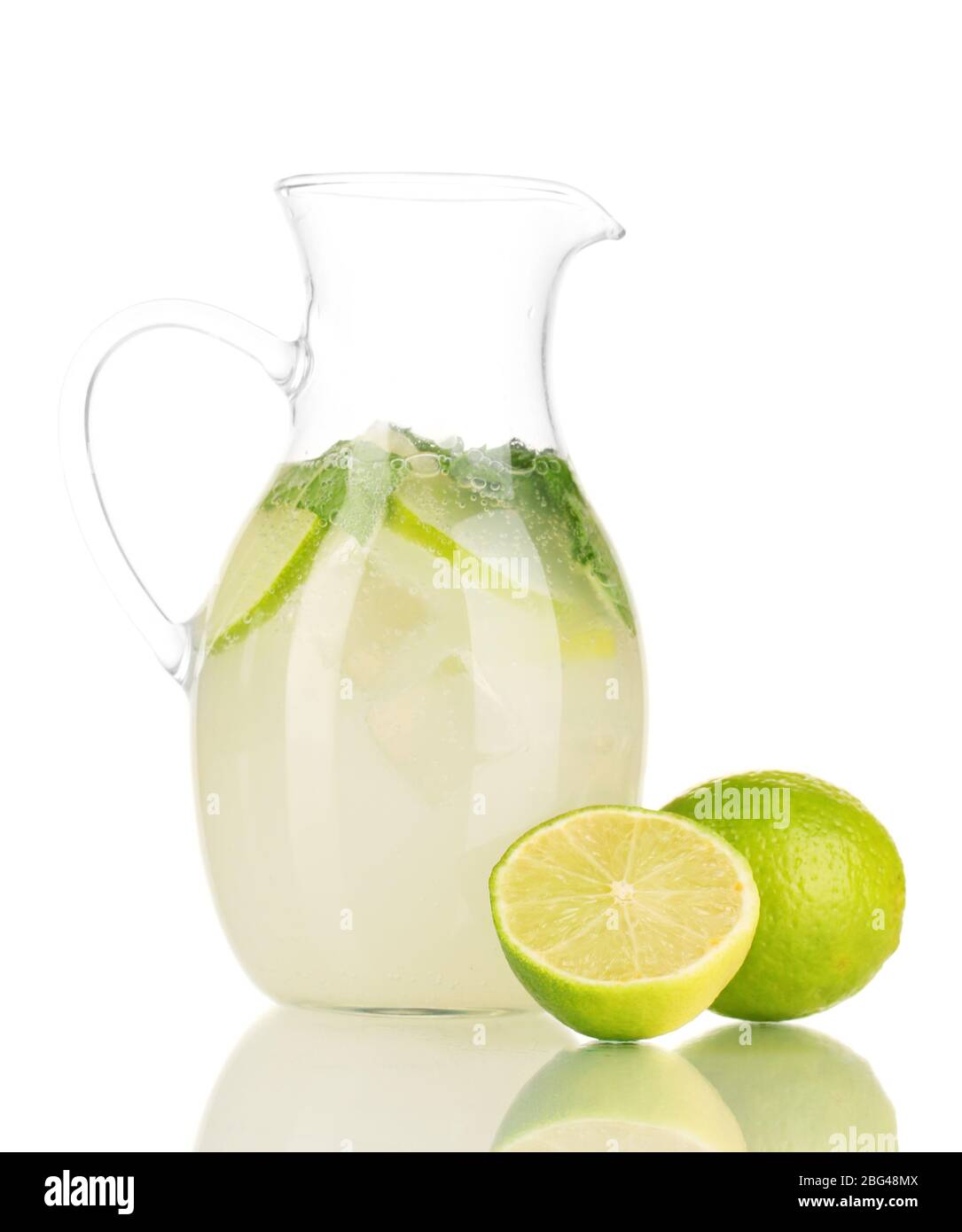 Lemonade in pitcher isolated on white Stock Photo - Alamy