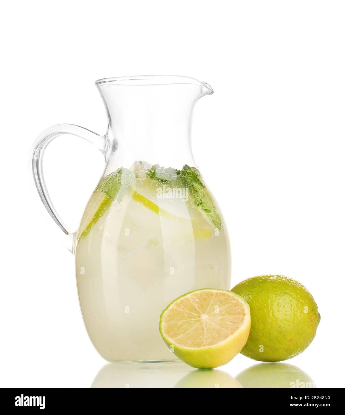 Lemonade in pitcher isolated on white Stock Photo - Alamy