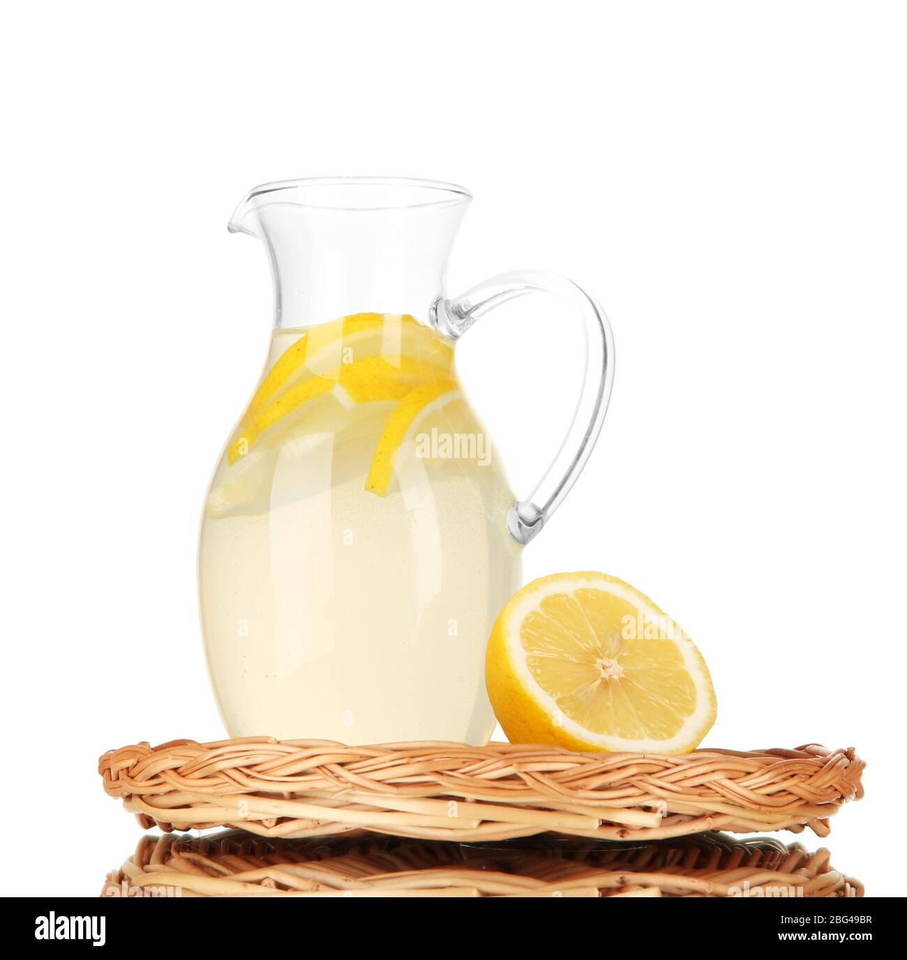 Lemonade in pitcher isolated on white Stock Photo - Alamy