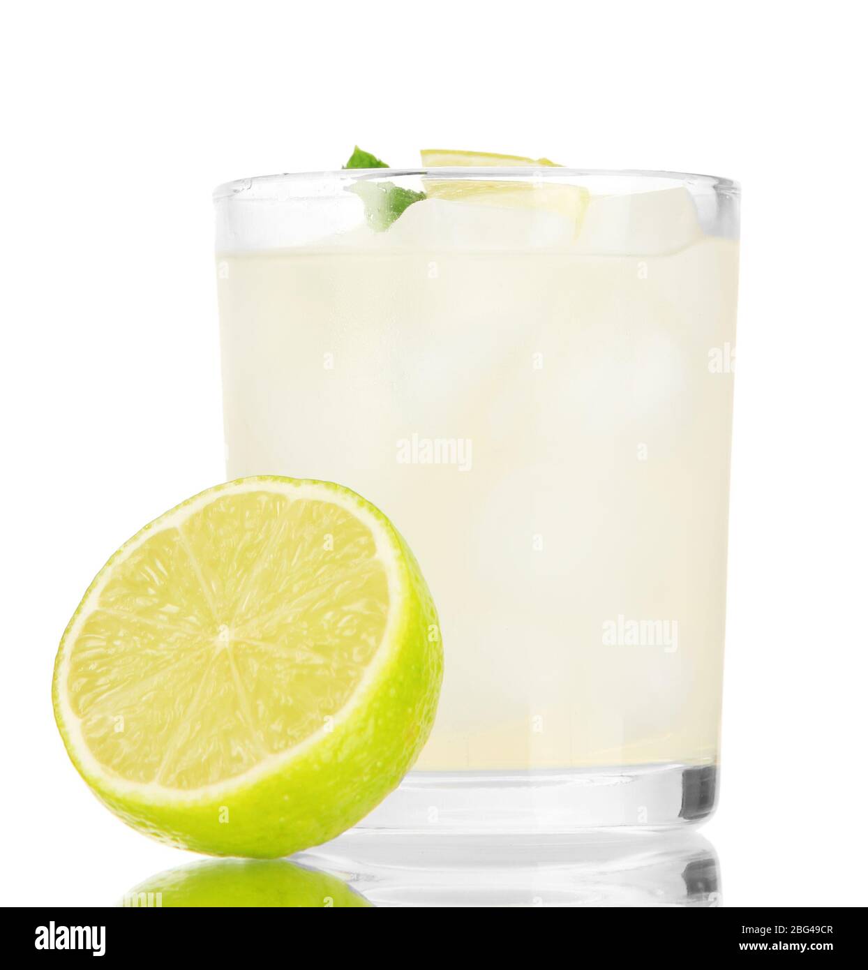 Lemonade in glass isolated on white Stock Photo - Alamy