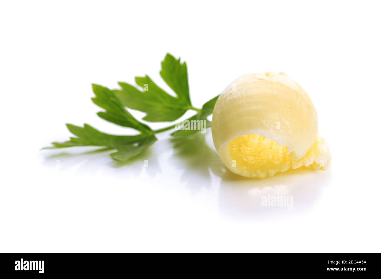 Butter curl, isolated on white Stock Photo - Alamy