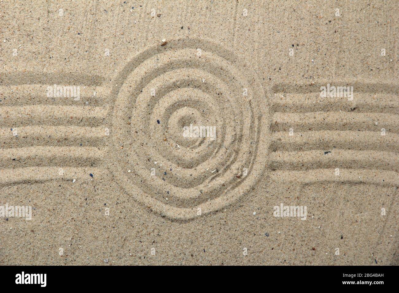 Zen garden with raked sand close up Stock Photo - Alamy