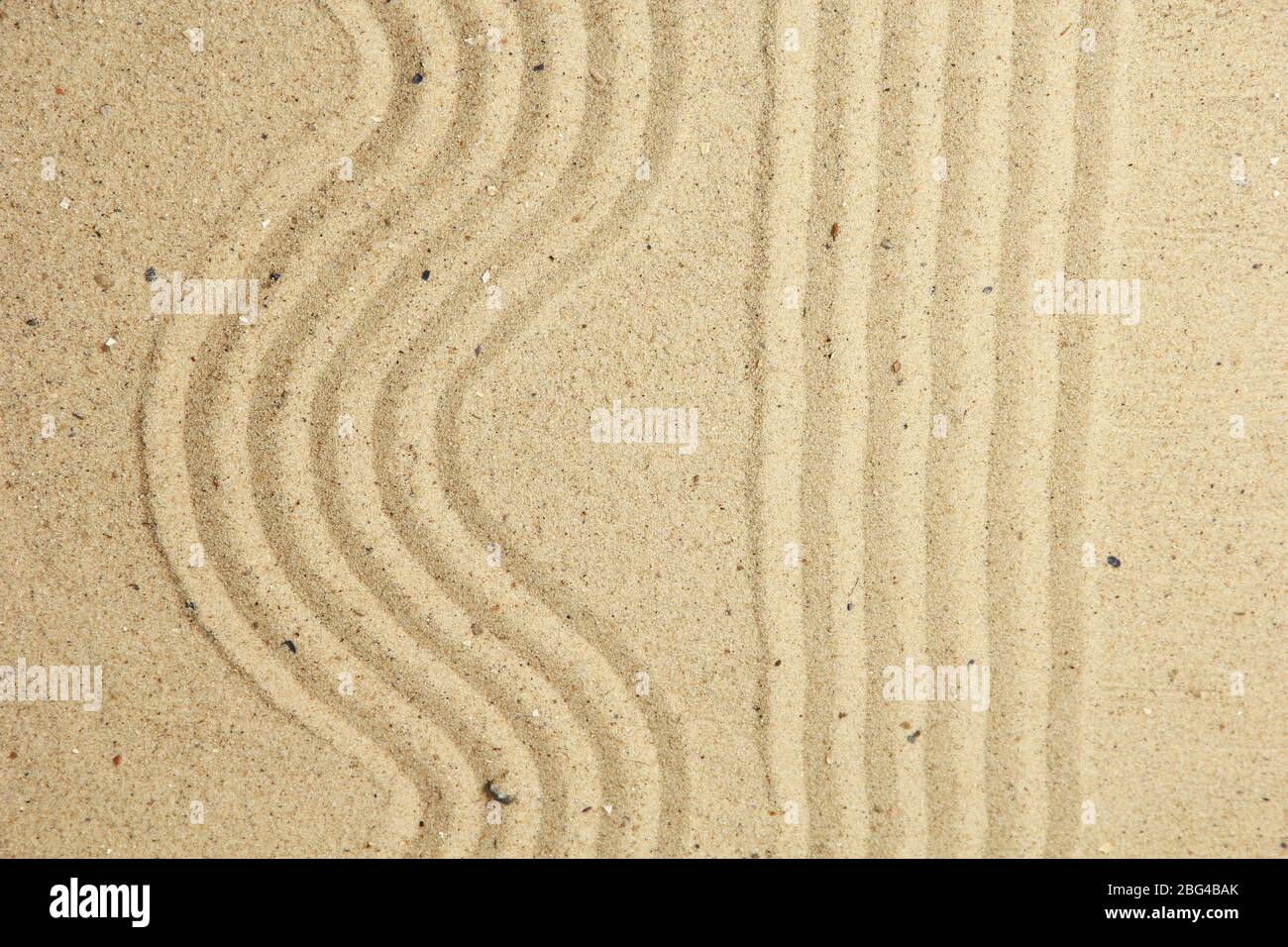 Zen garden with raked sand close up Stock Photo - Alamy