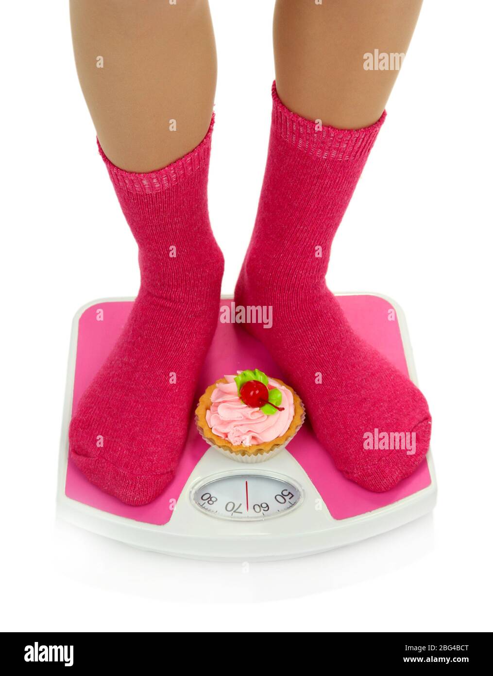 Female feet on scales, isolated on white Stock Photo - Alamy