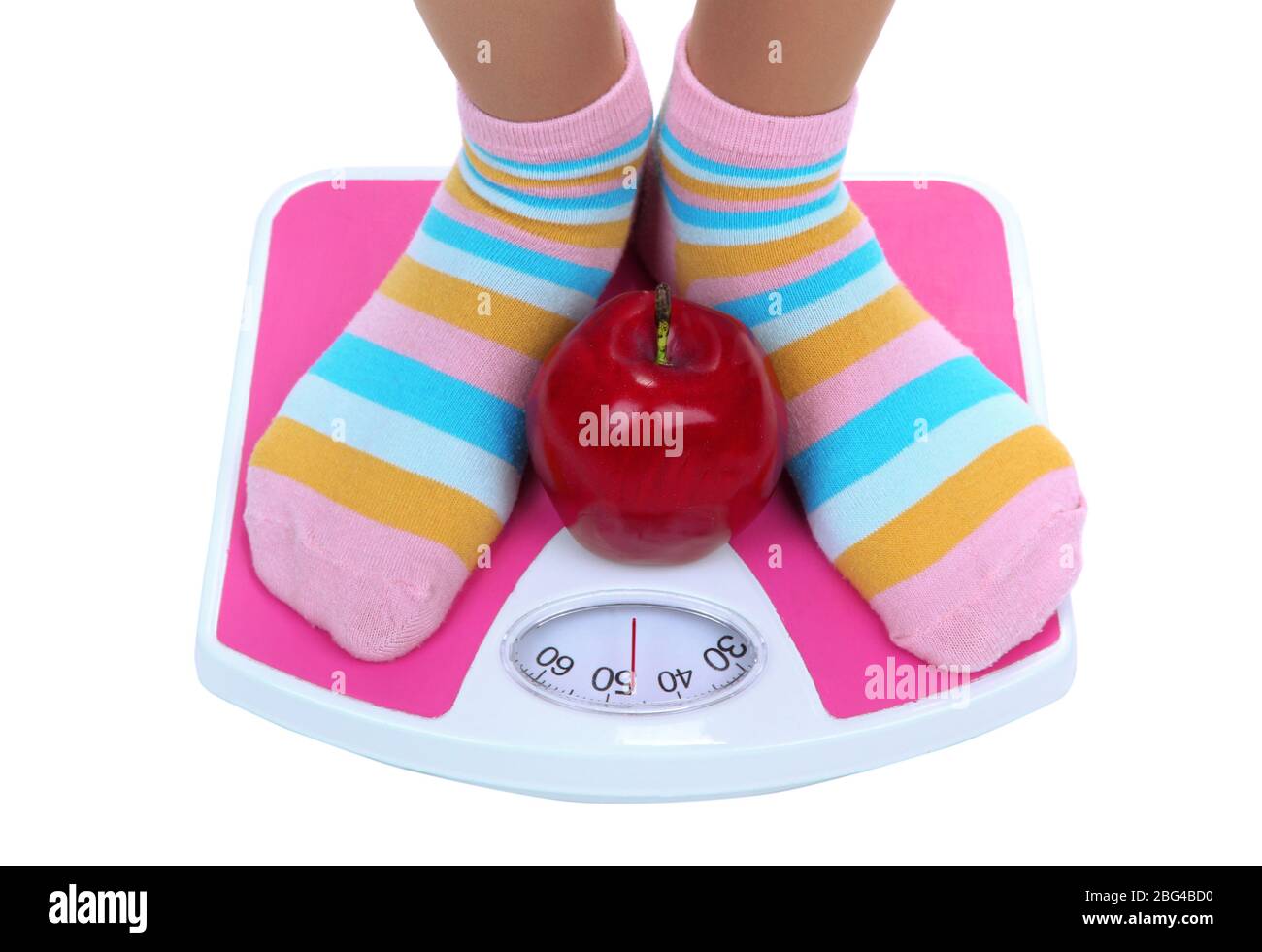 Female feet on scales, isolated on white Stock Photo - Alamy