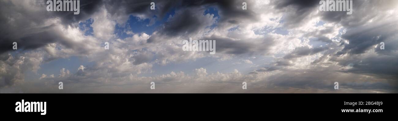 Fluffy clouds in the overcast sky view. Climate, environment and weather concept sky panoramic ...