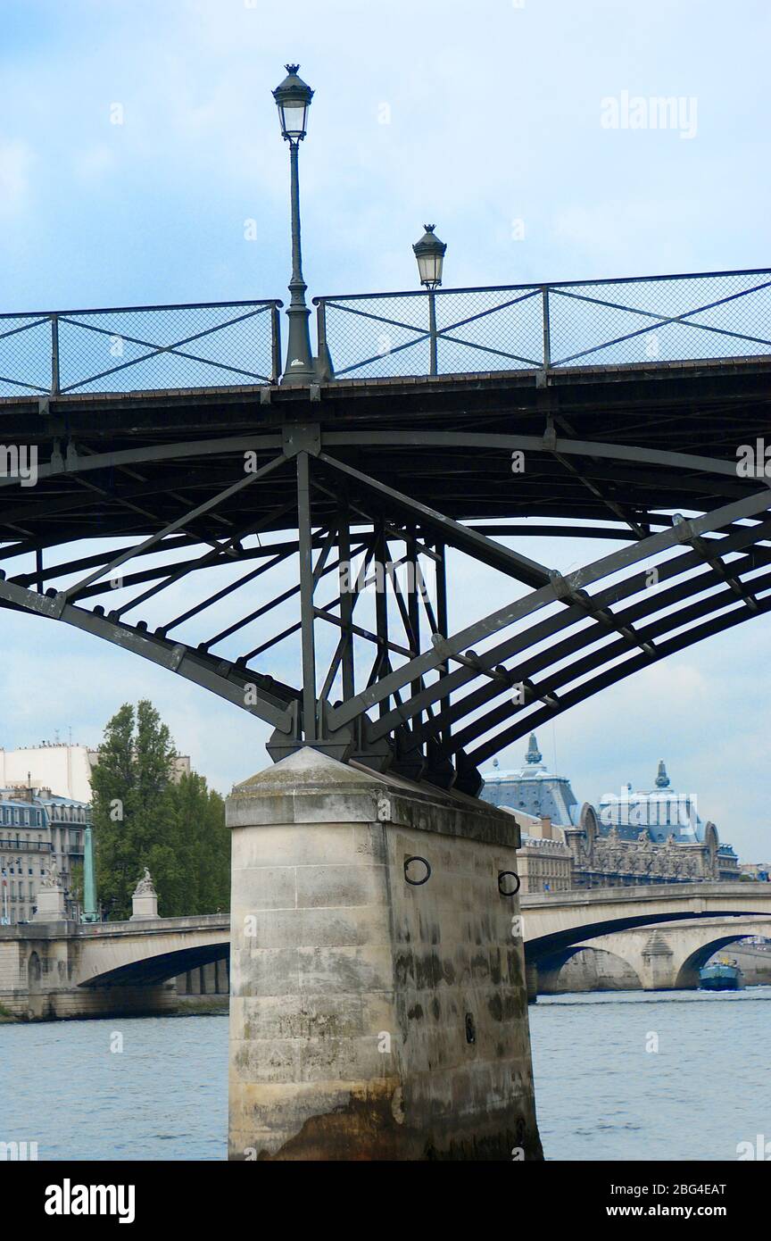 The Pont des Arts pedestrian bridge ove the River Seine in central ...