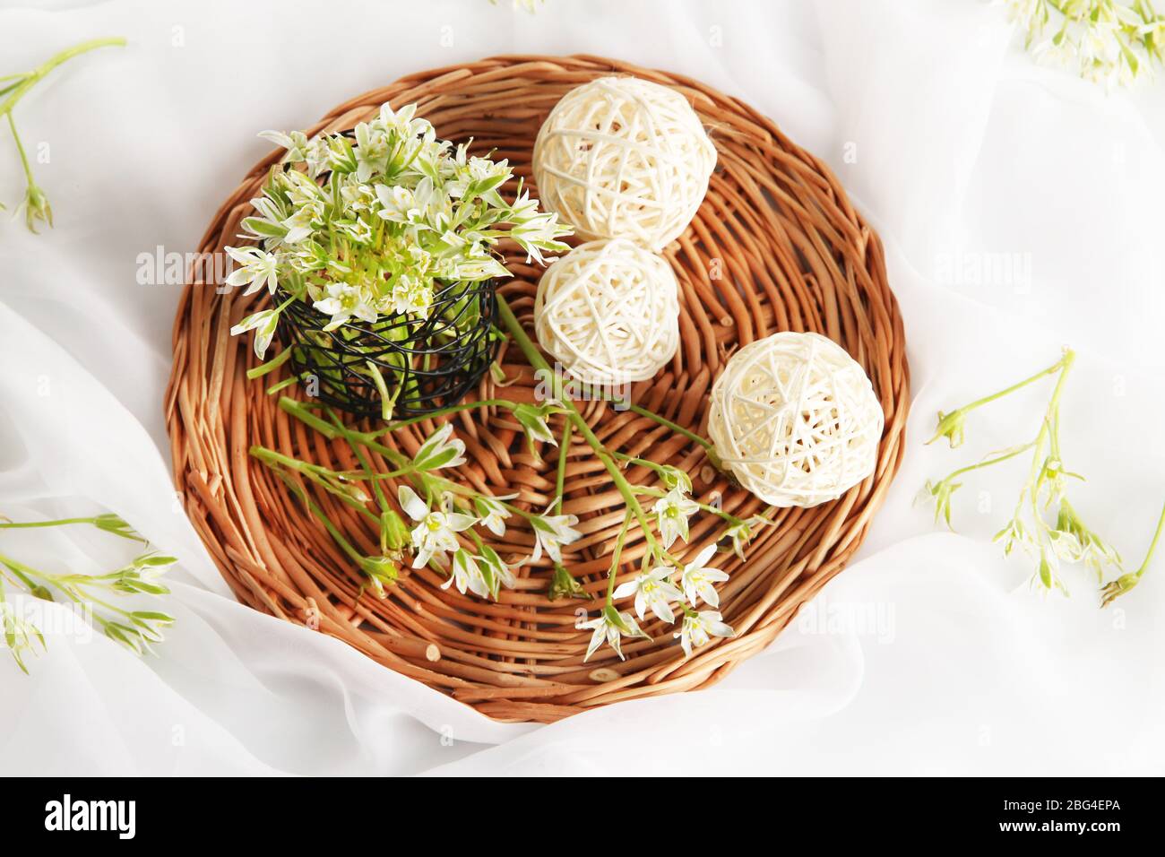 Composition with spring flowers on white satin background Stock Photo ...