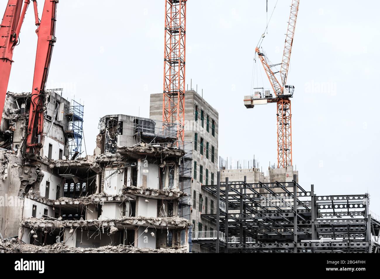 Urban scene. Dismantling of a house. Building demolition and crashing ...
