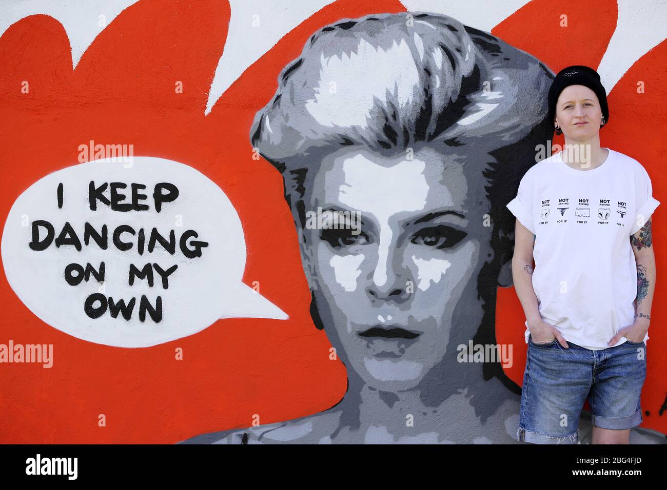 Irish artist Emmalene Blake with her mural of singer-songwriter Robyn ...