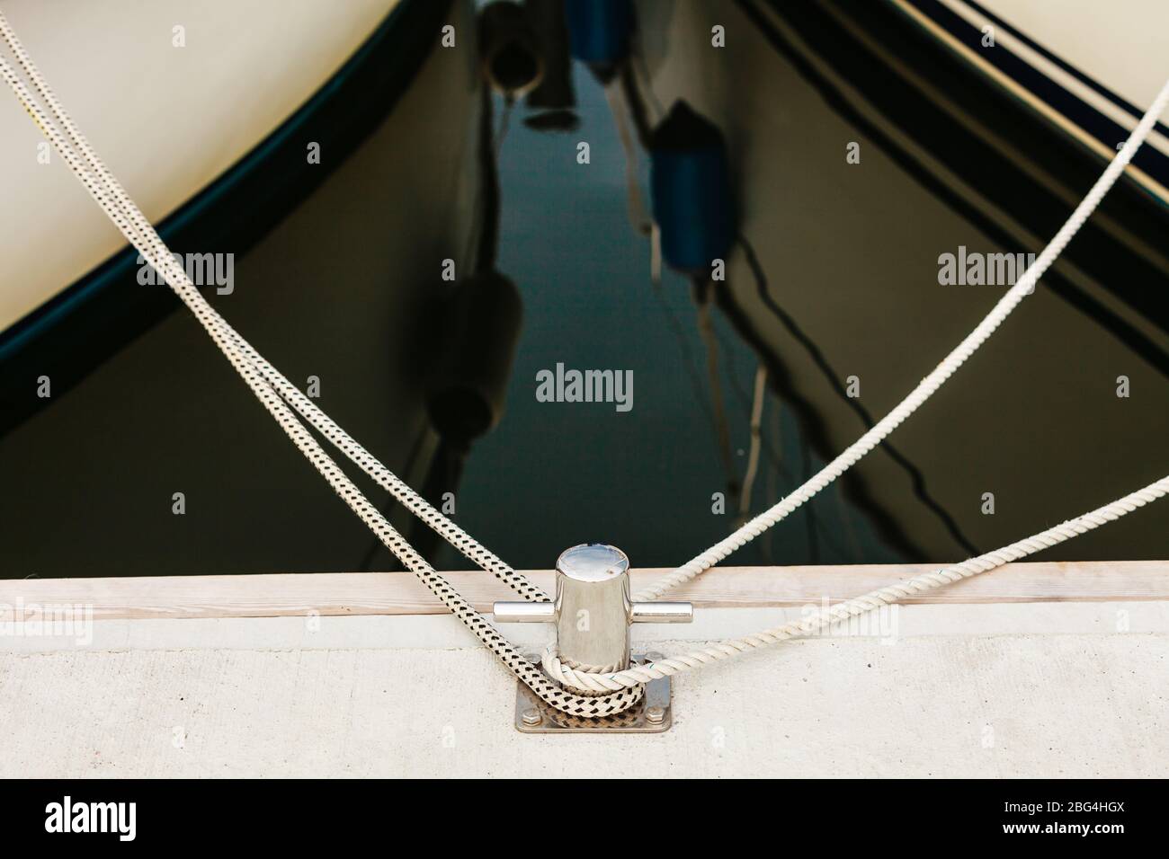 Jetty objects concept. New metal steel harbor marina bolts with ship ...