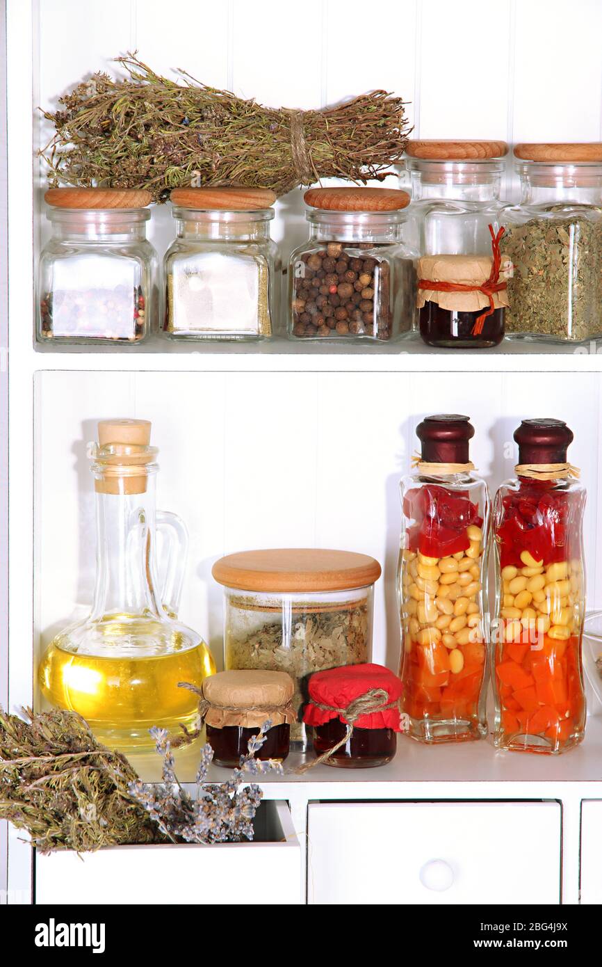 Variety spices on kitchen shelves Stock Photo - Alamy