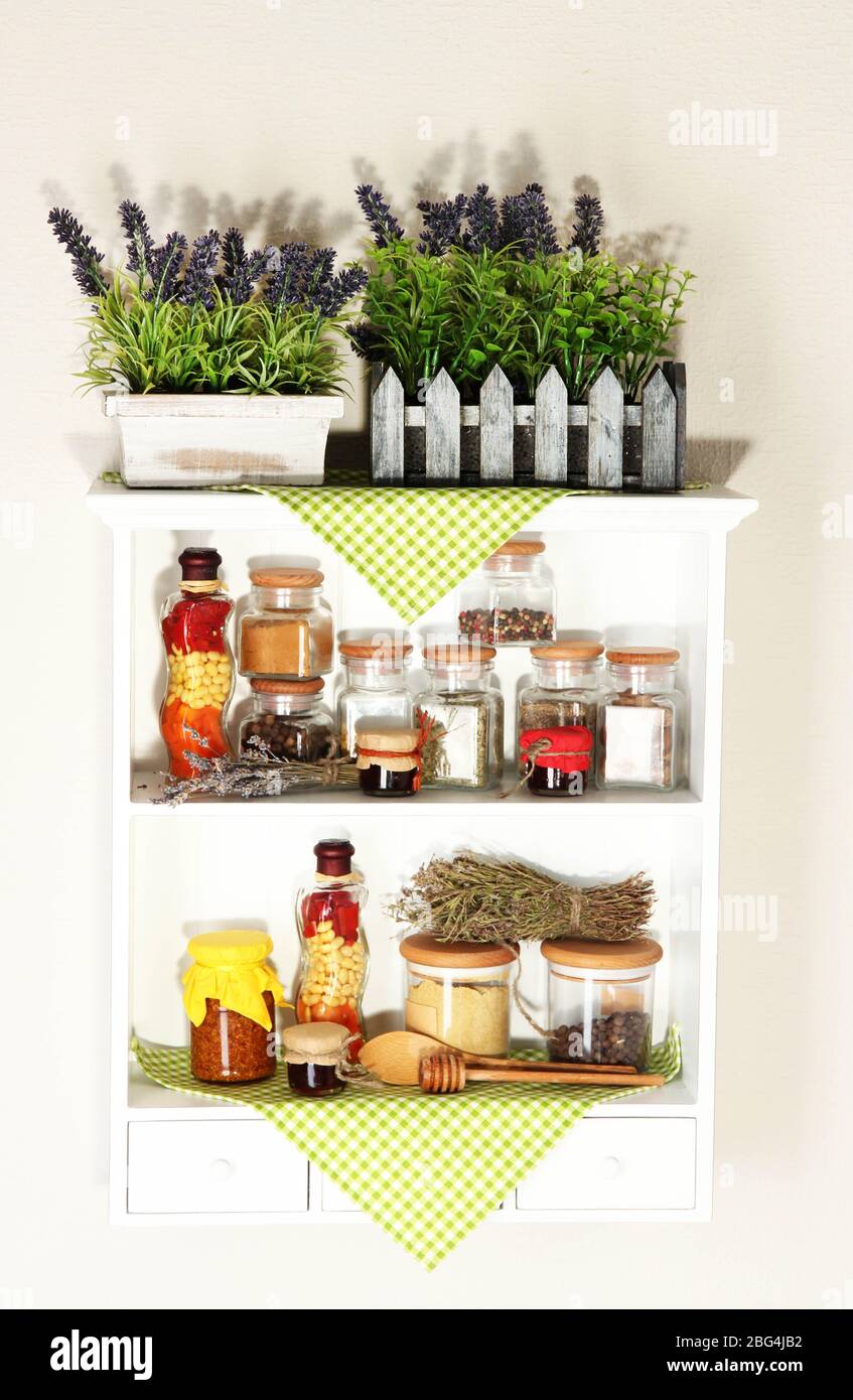 Variety spices on kitchen shelves Stock Photo - Alamy