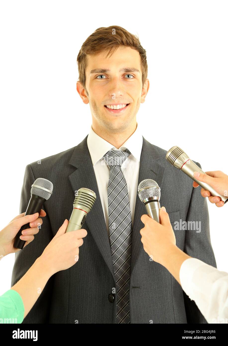 Interview with a young businessman, isolated on white Stock Photo - Alamy