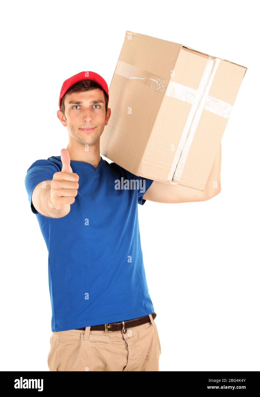 Young delivery man holding parcel, isolated on white Stock Photo - Alamy