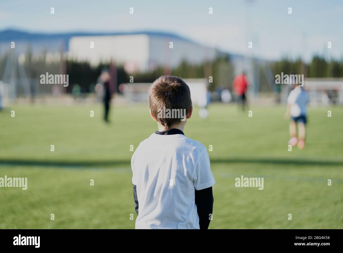 gatekeeper children soccer player in action. stadium Stock Photo - Alamy