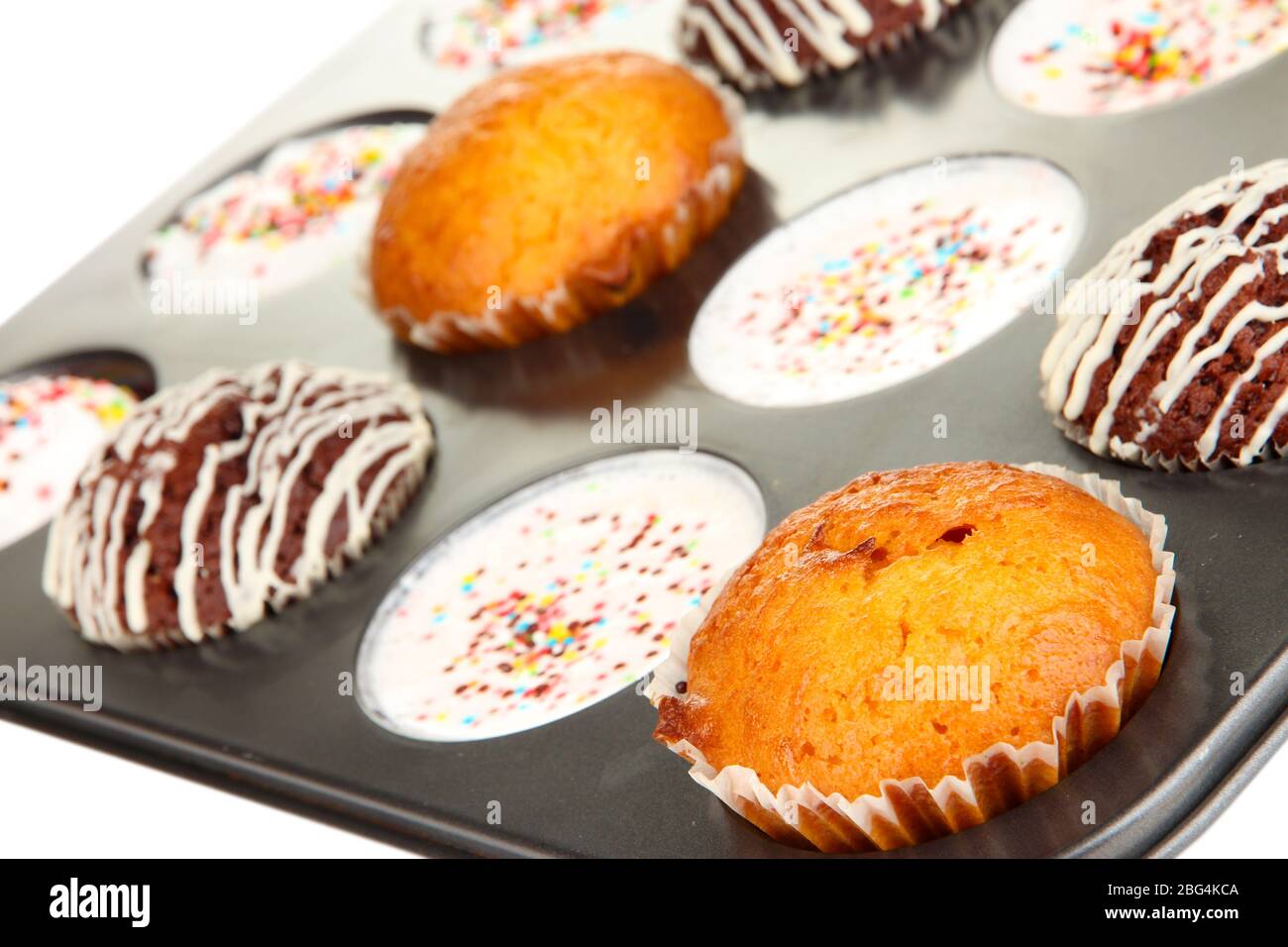 Tasty muffin cakes in baking tray close up Stock Photo - Alamy