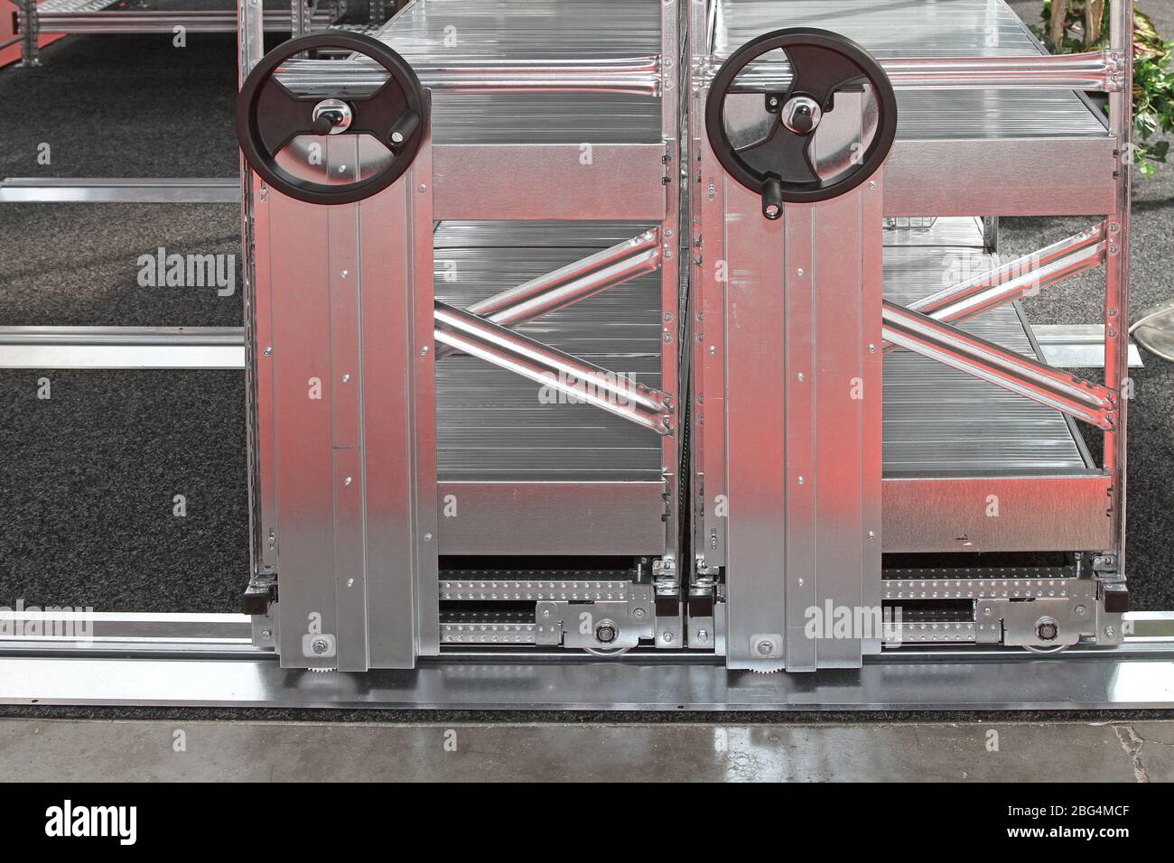 Hand Crank Movable Metal Shelving System in Storage Stock Photo - Alamy