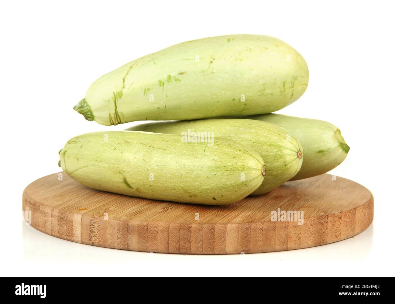 Fresh marrows on cutting board, isolated on white Stock Photo - Alamy