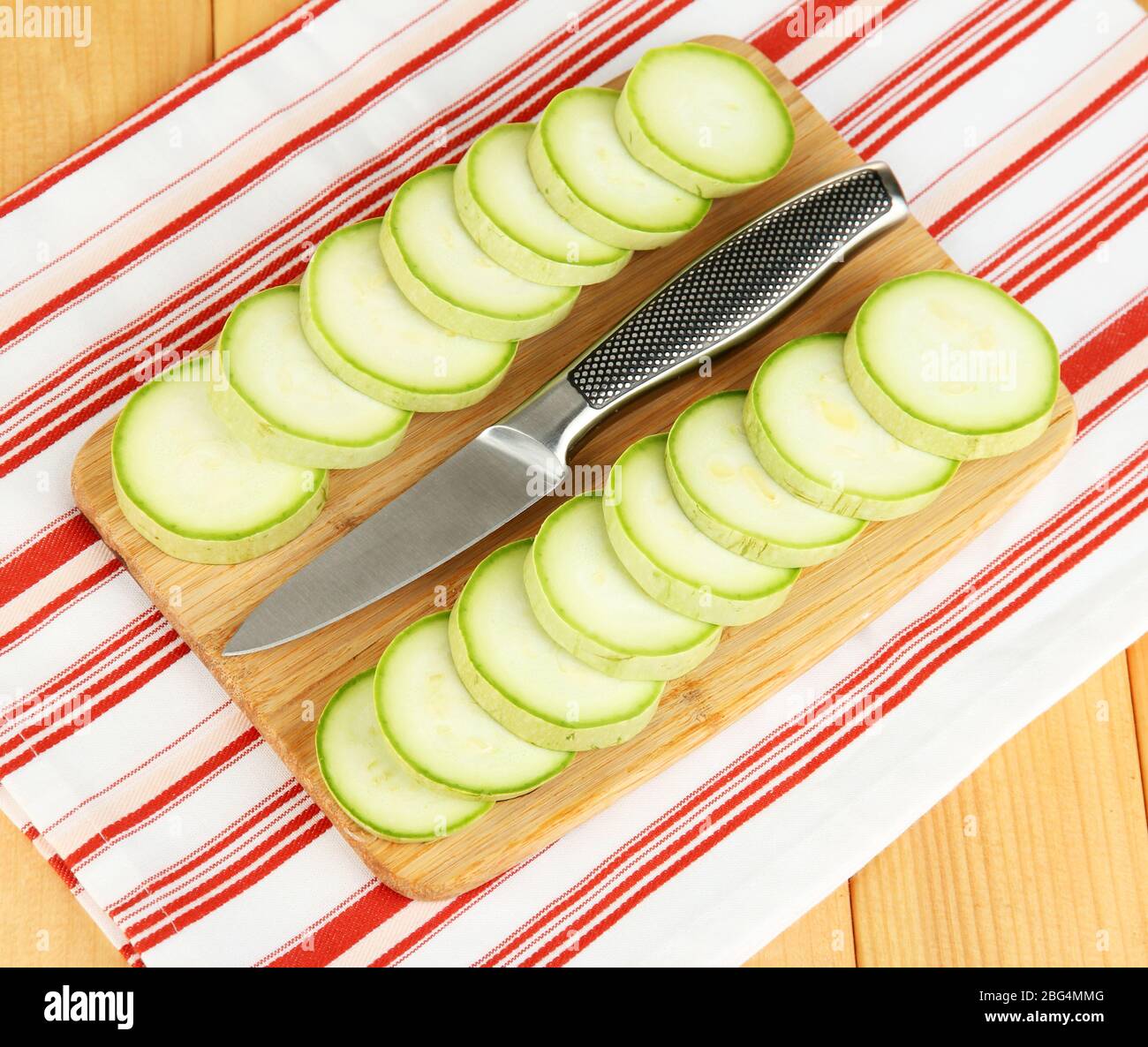Fresh marrows on cutting board, on wooden background Stock Photo - Alamy
