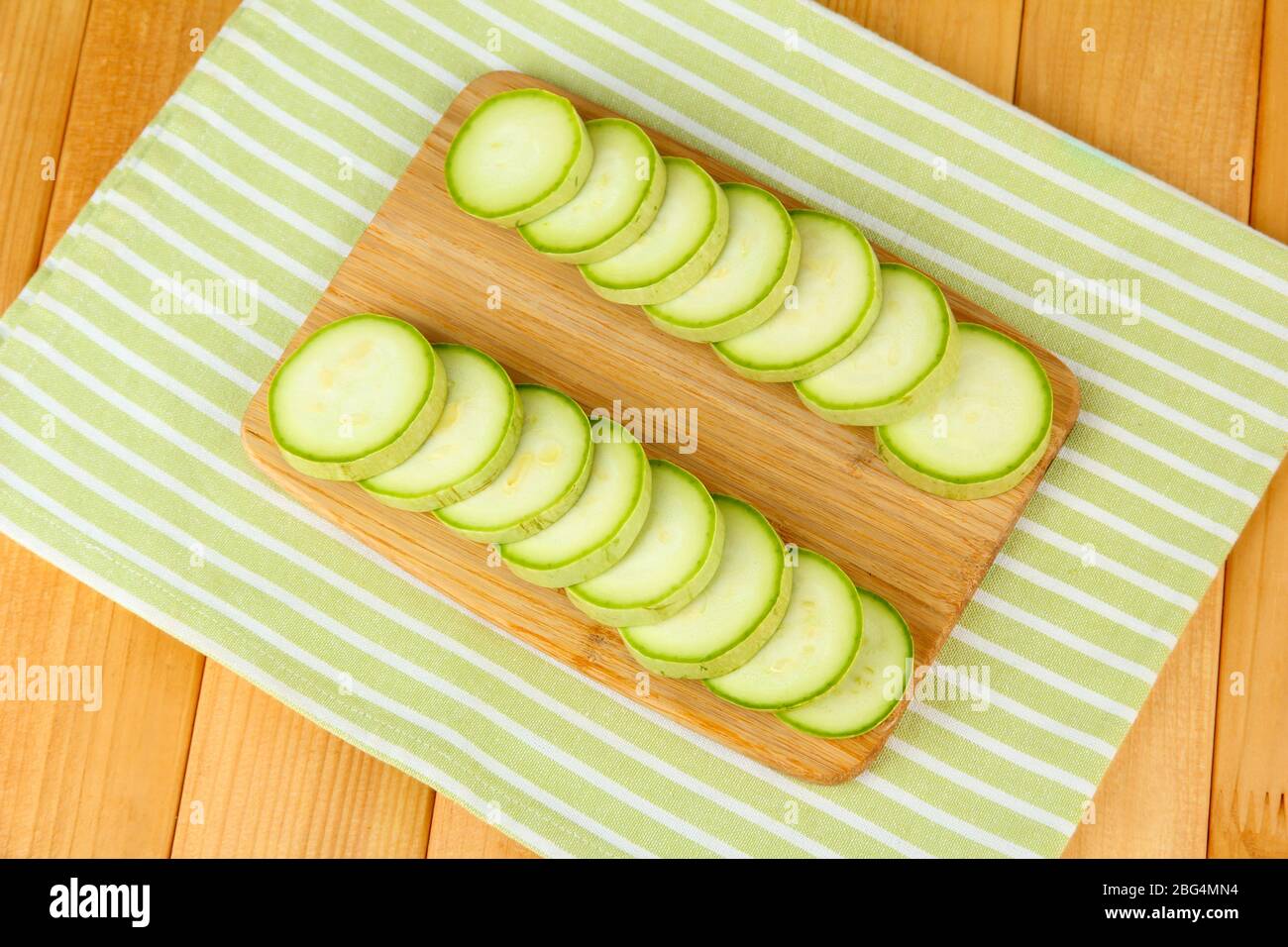 Fresh marrows on cutting board, on wooden background Stock Photo - Alamy