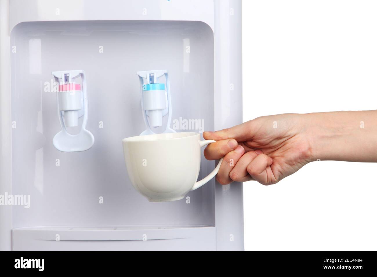 Woman filling cup at water cooler Stock Photo - Alamy