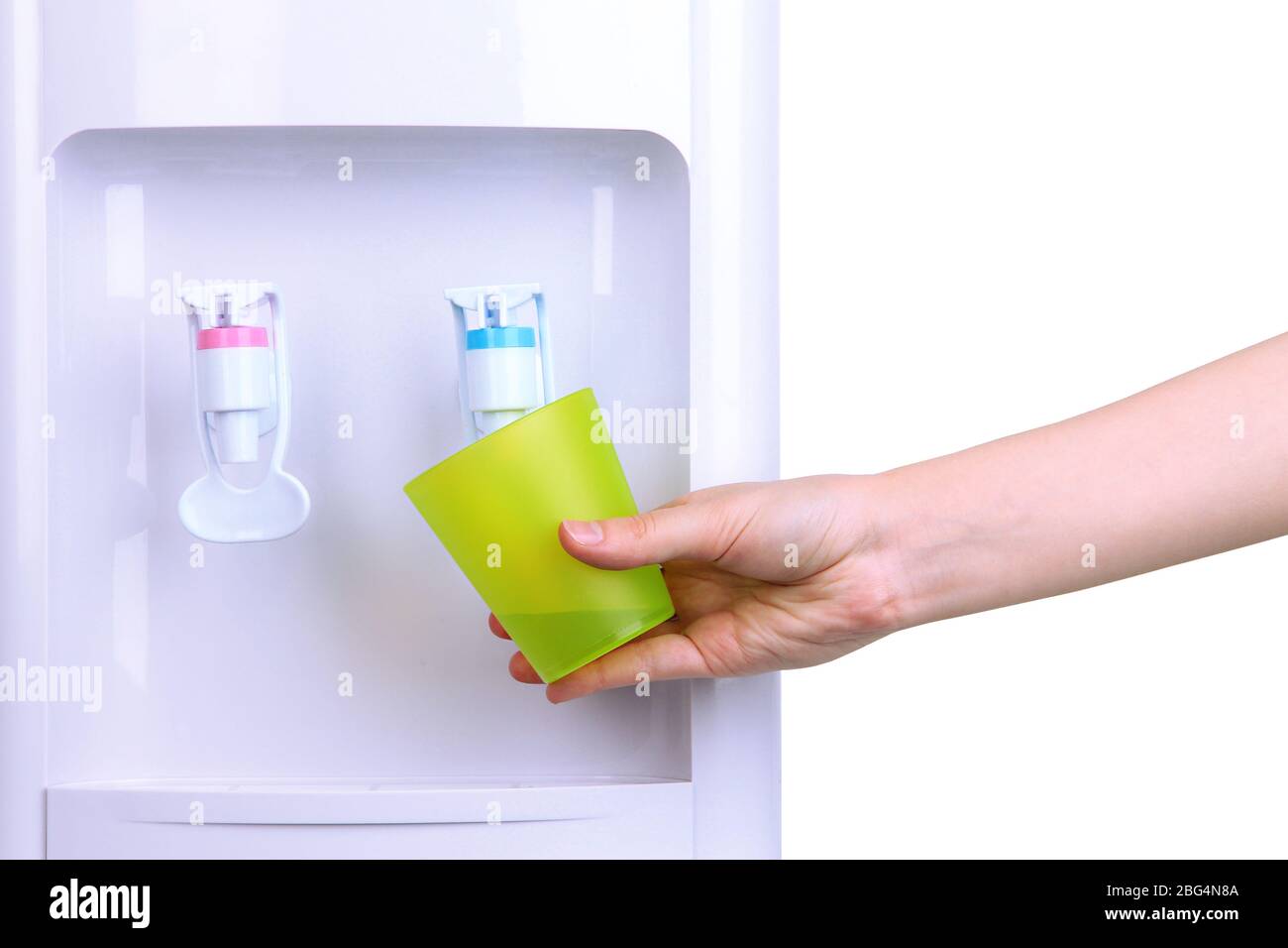 Woman filling cup at water cooler Stock Photo - Alamy