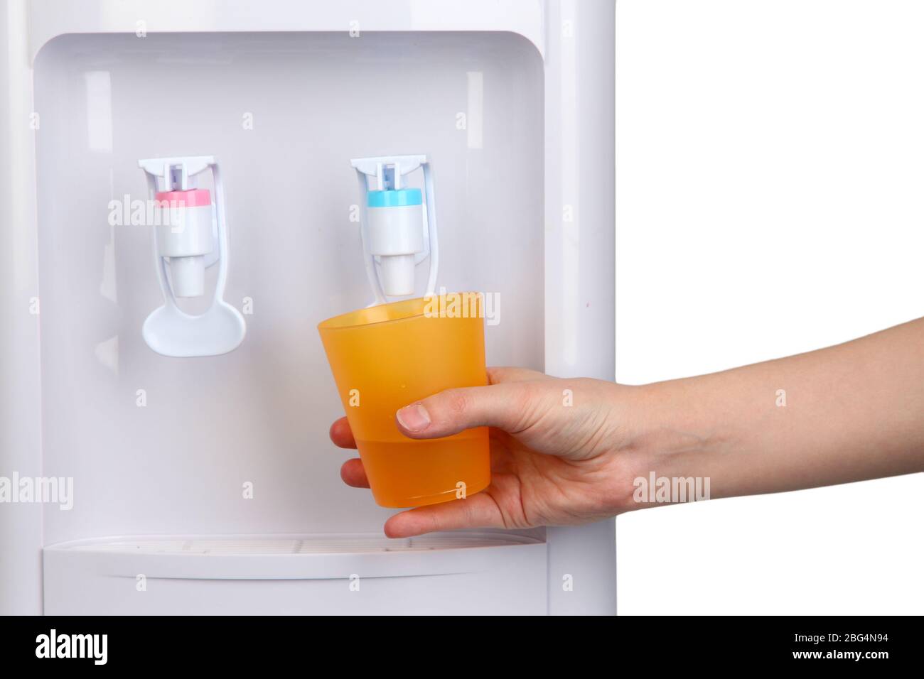 Woman filling cup at water cooler Stock Photo - Alamy