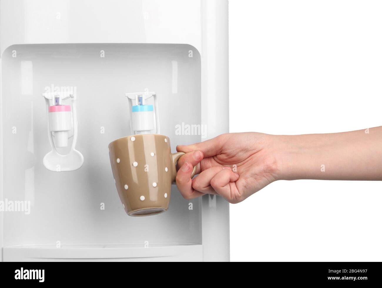 Woman filling cup at water cooler Stock Photo - Alamy