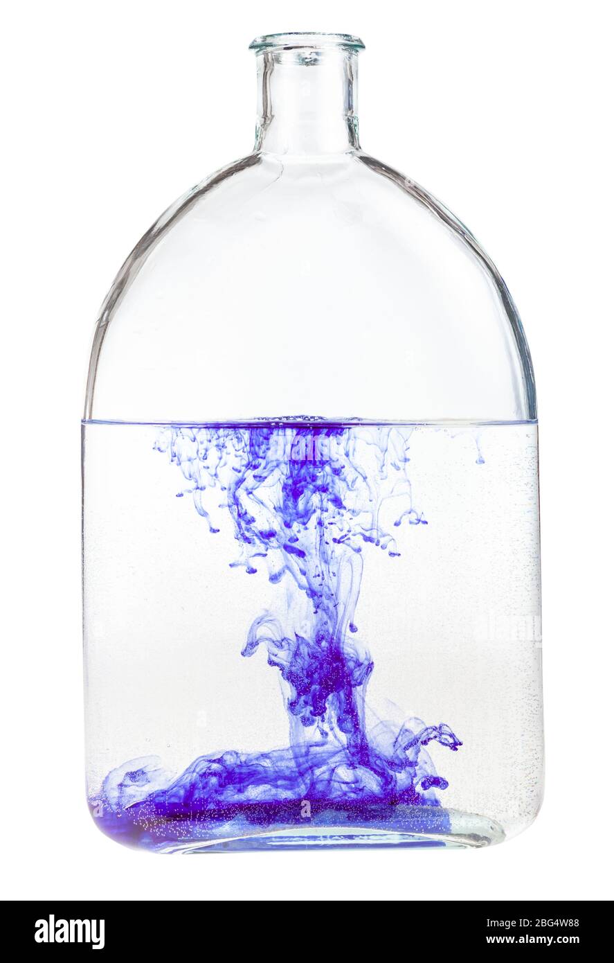violet watercolour dissolves in water in glass flask isolated on white ...