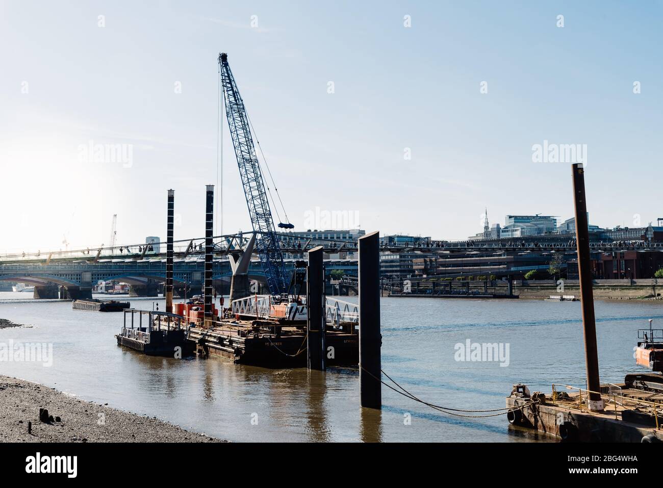 London, UK - May 14, 2019: Dredger on River Thames. View from viewed ...