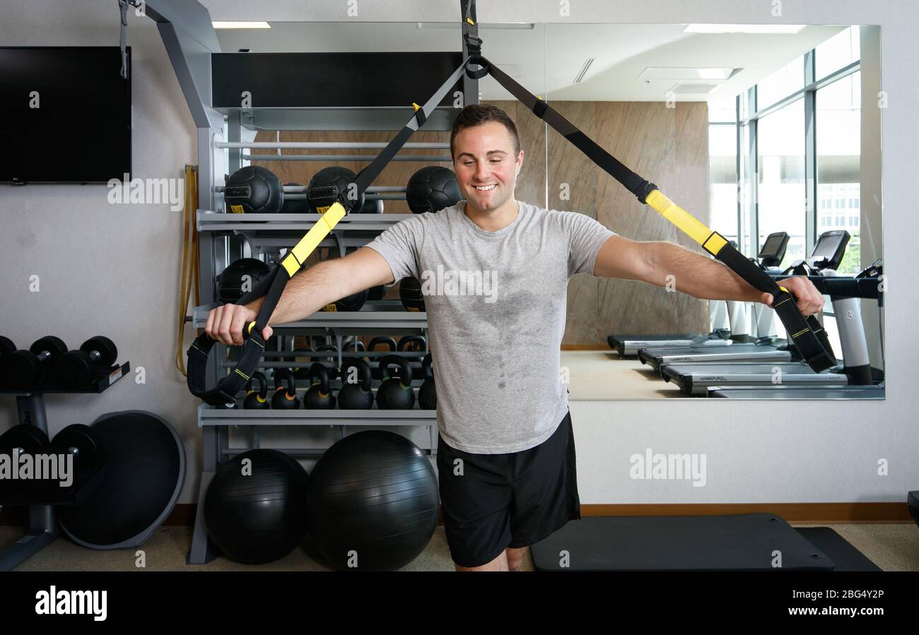 White male works out in indoor gym Stock Photo - Alamy