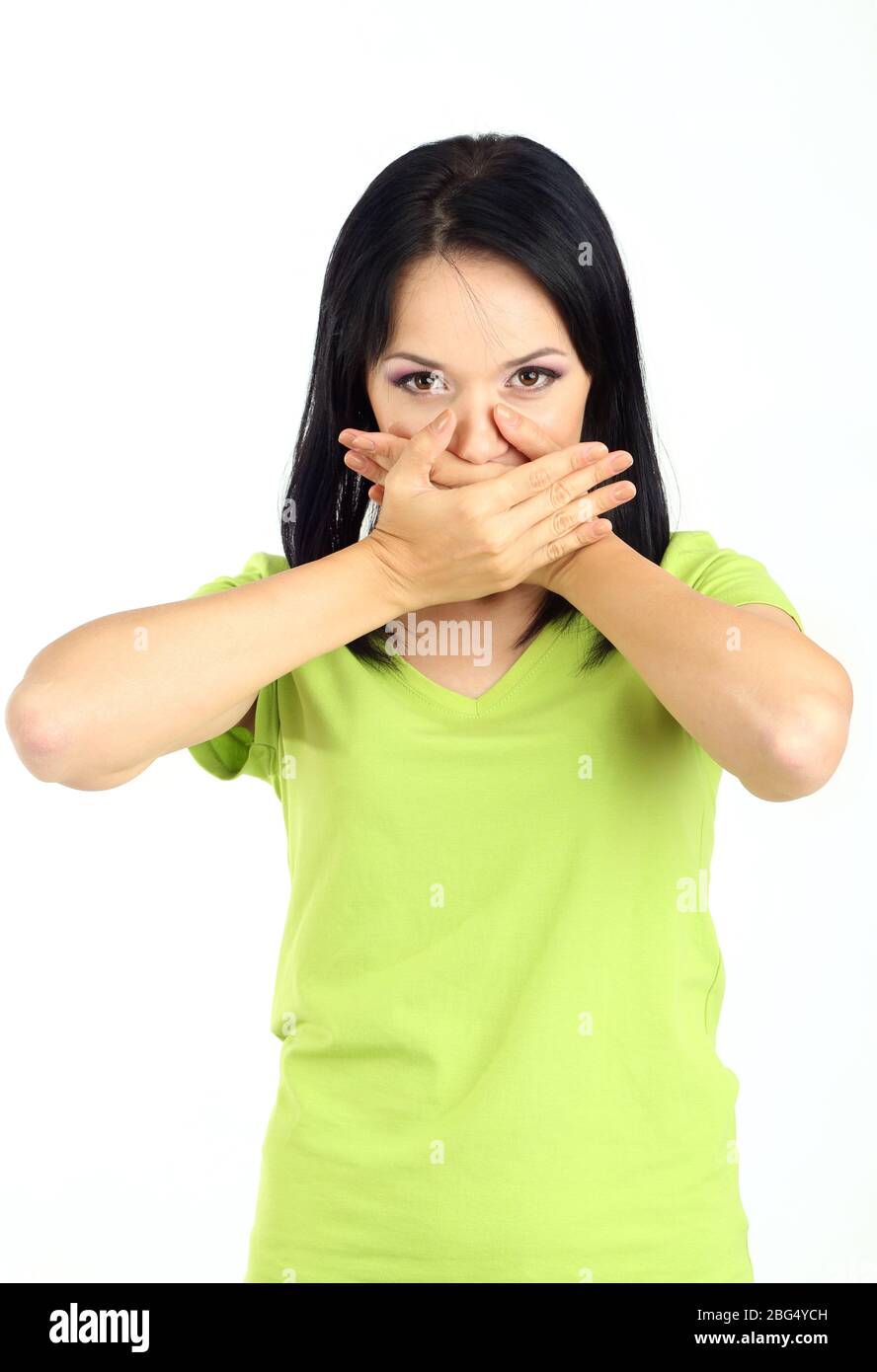 Girl shows sign of silence isolated on white Stock Photo - Alamy