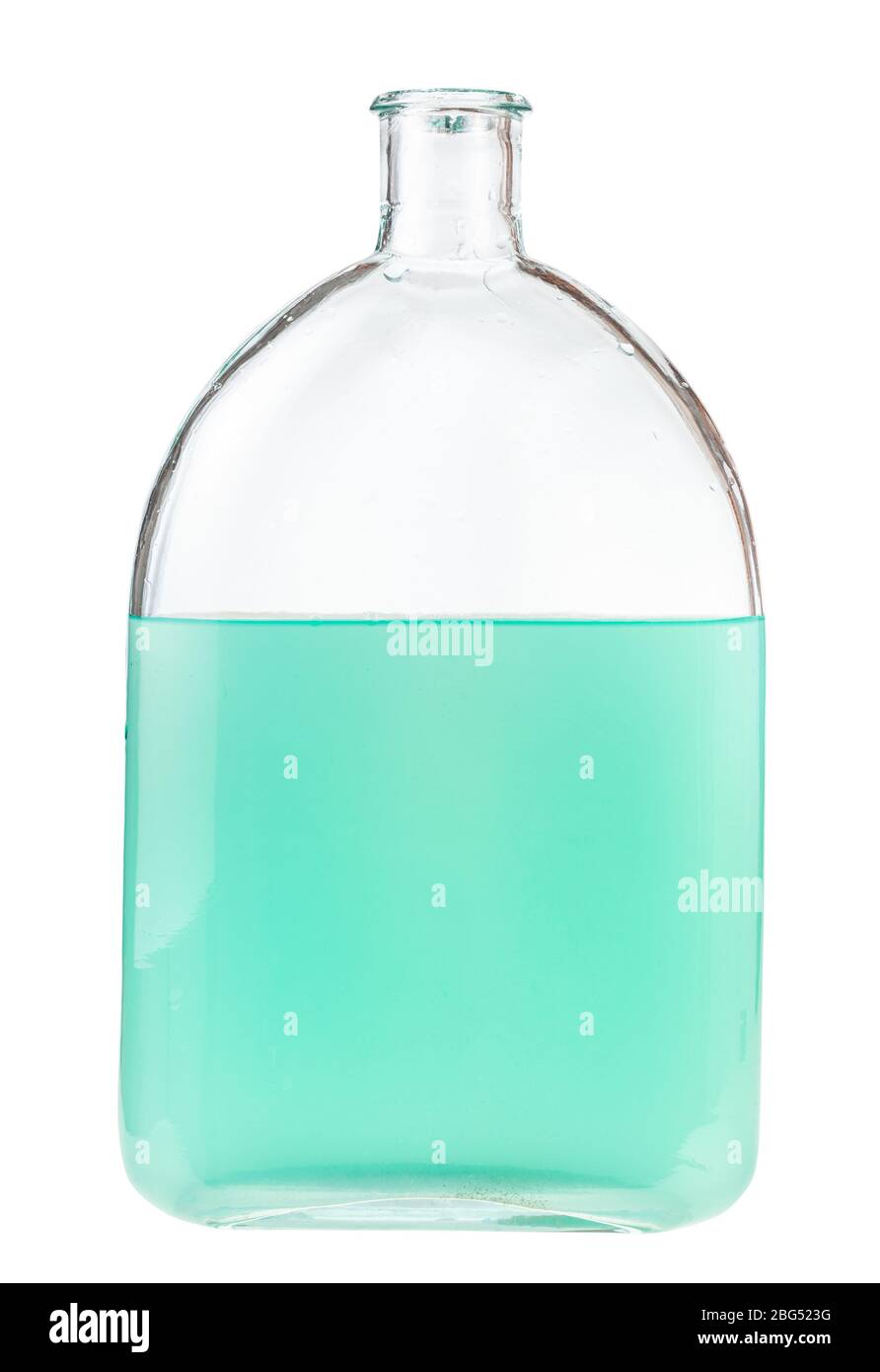 solution of green watercolour in water in glass flask isolated on white ...