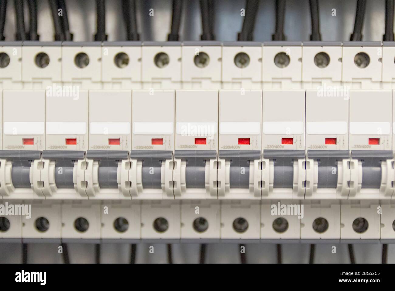 Voltage switchboard with circuit breakers. Electrical background Stock ...