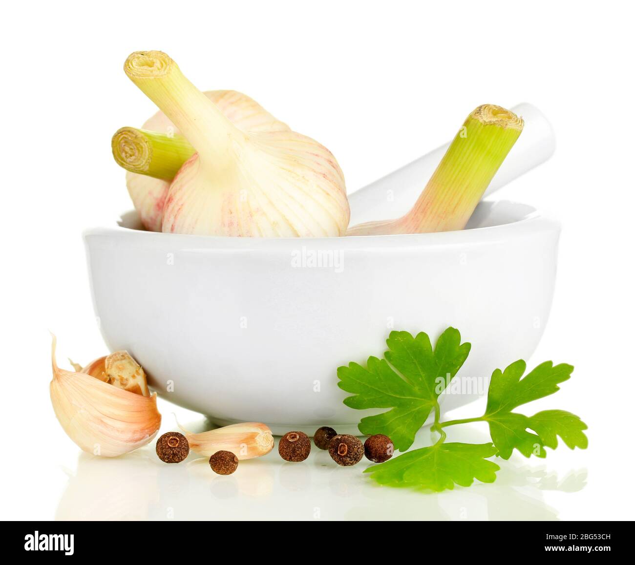 Garlic isolated on white Stock Photo - Alamy