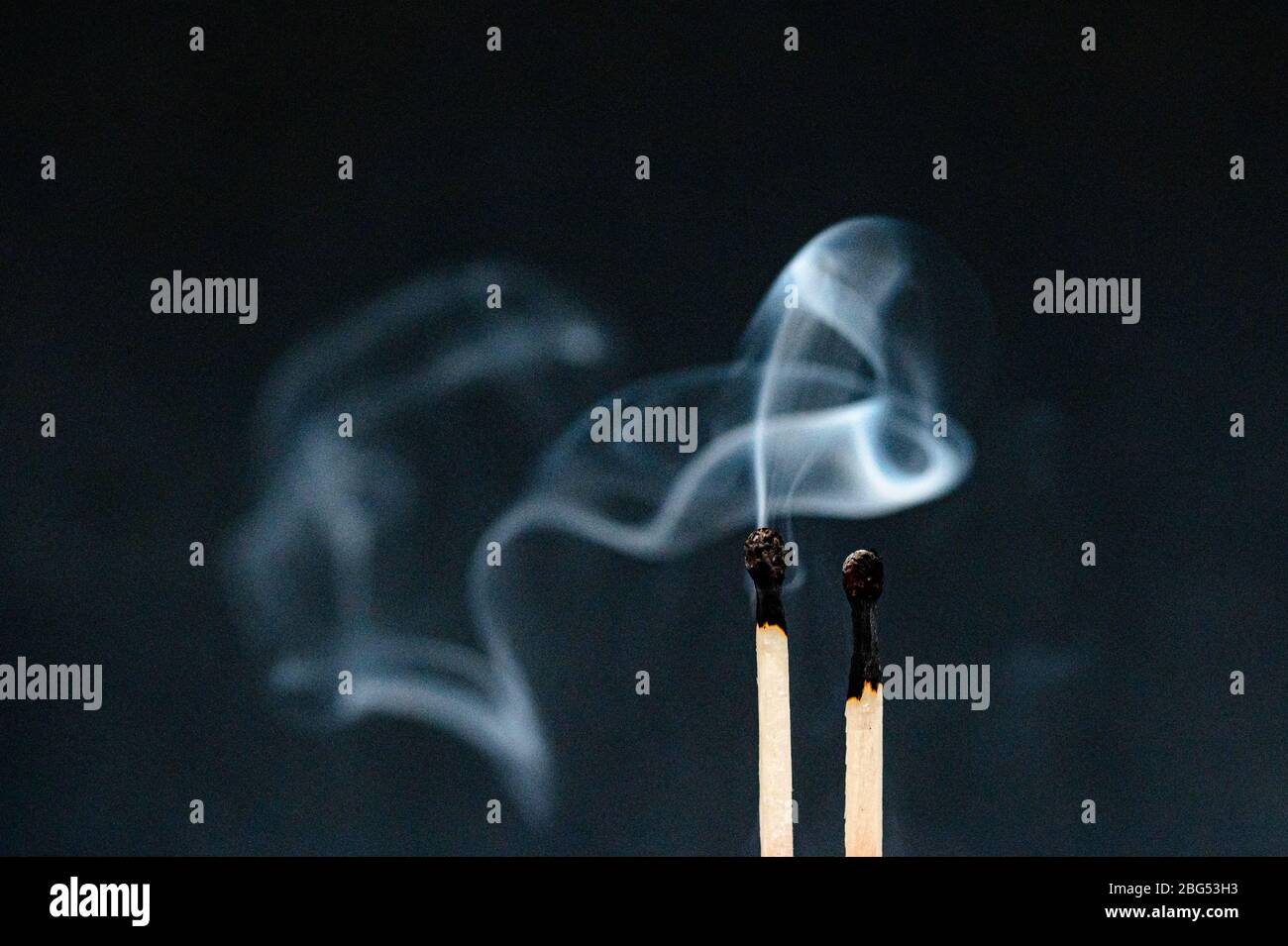 Smoke rising from extinguised matchsticks Stock Photo - Alamy
