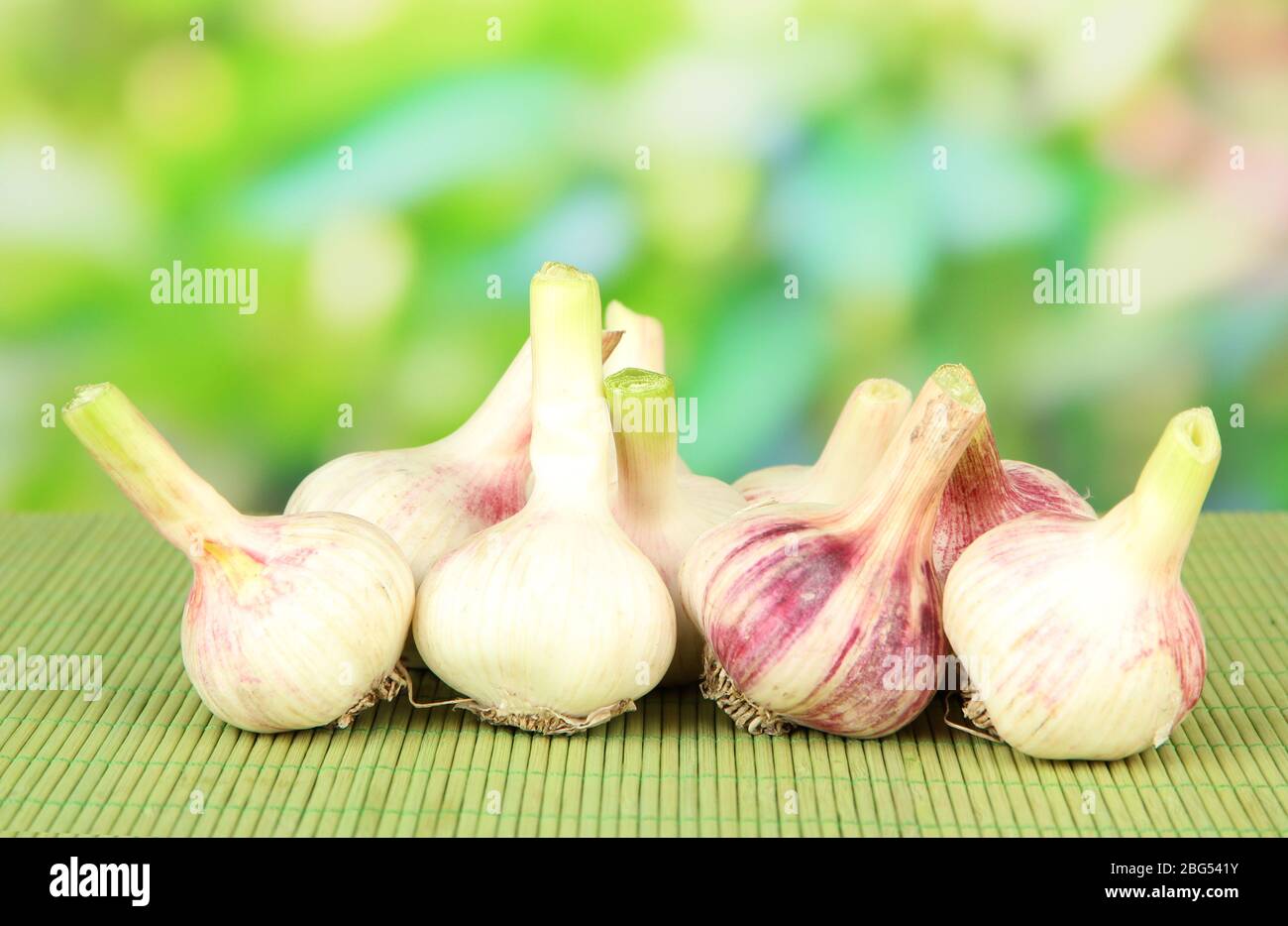 Fresh garlic, on bright background Stock Photo - Alamy