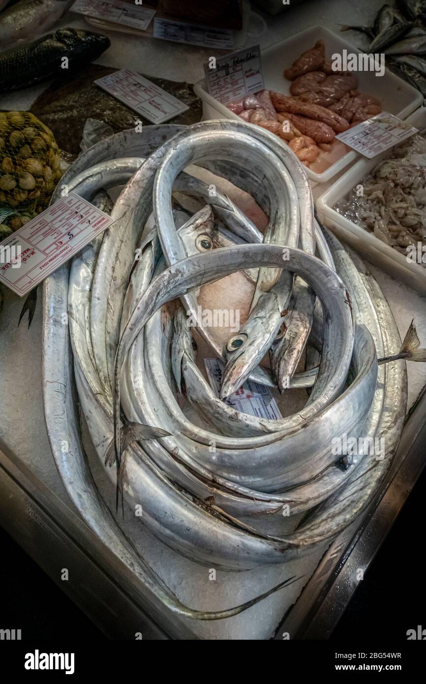 A group of silver swordfish for sale on a market stall Stock Photo - Alamy