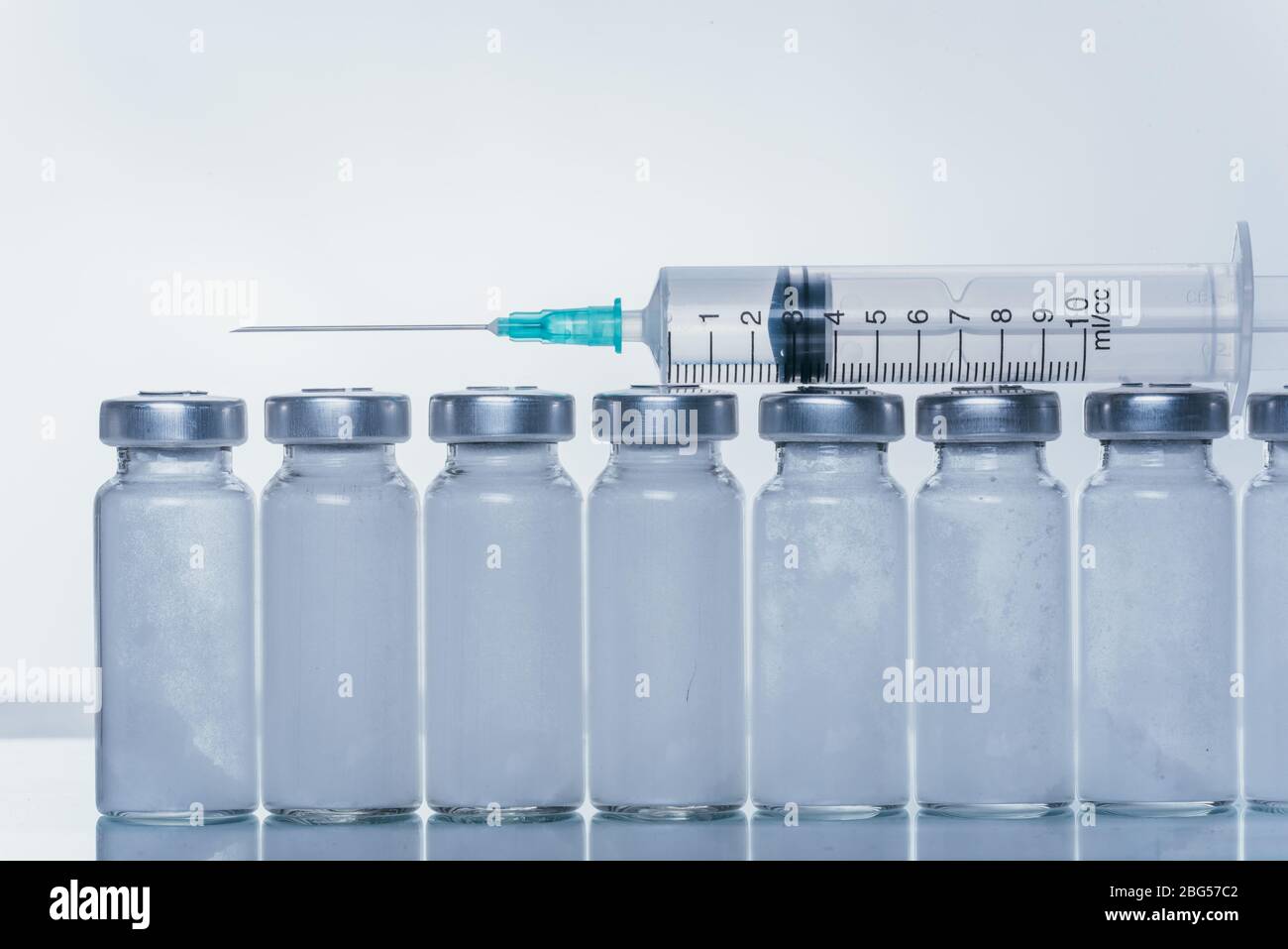 Medicine, Injection, vaccine and disposable syringe, drug concept ...