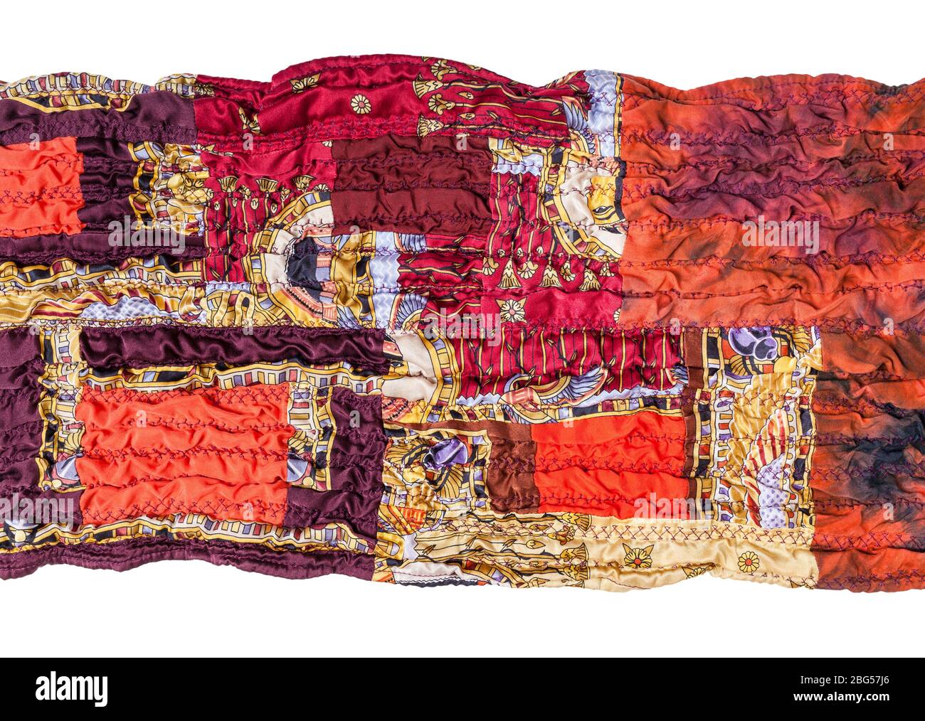 fragment of stitched red brown patchwork scarf isolated on white ...
