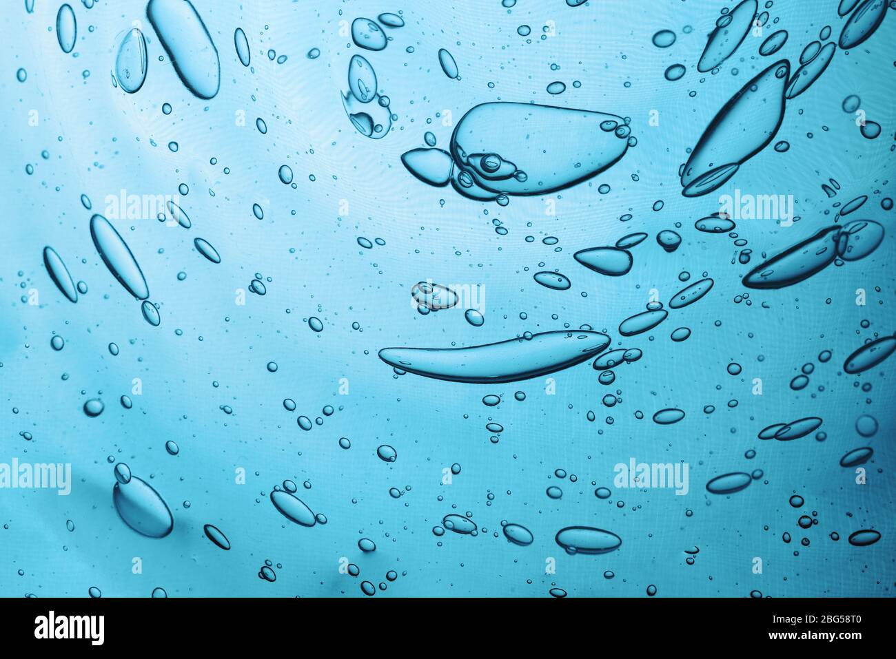 Water texture with bubbles Hyaluronic acid cosmetic gel. Gel texture ...