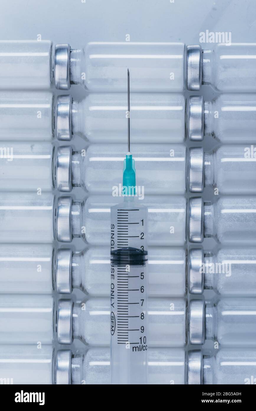 Medicine, Injection, vaccine and disposable syringe, drug concept ...