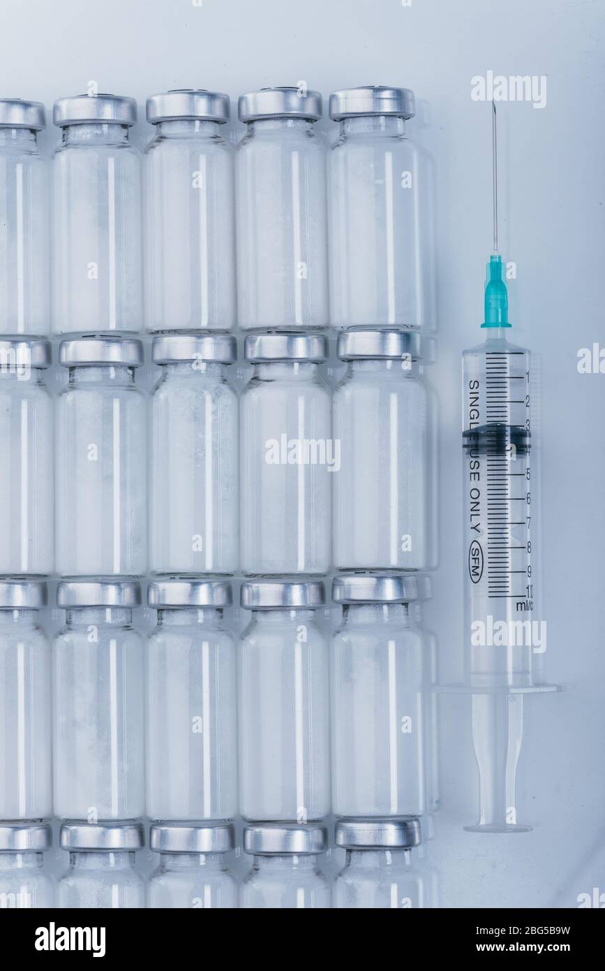 Medicine, Injection, vaccine and disposable syringe, drug concept ...