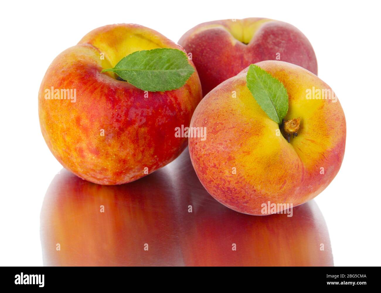 Peaches on metal background Stock Photo - Alamy