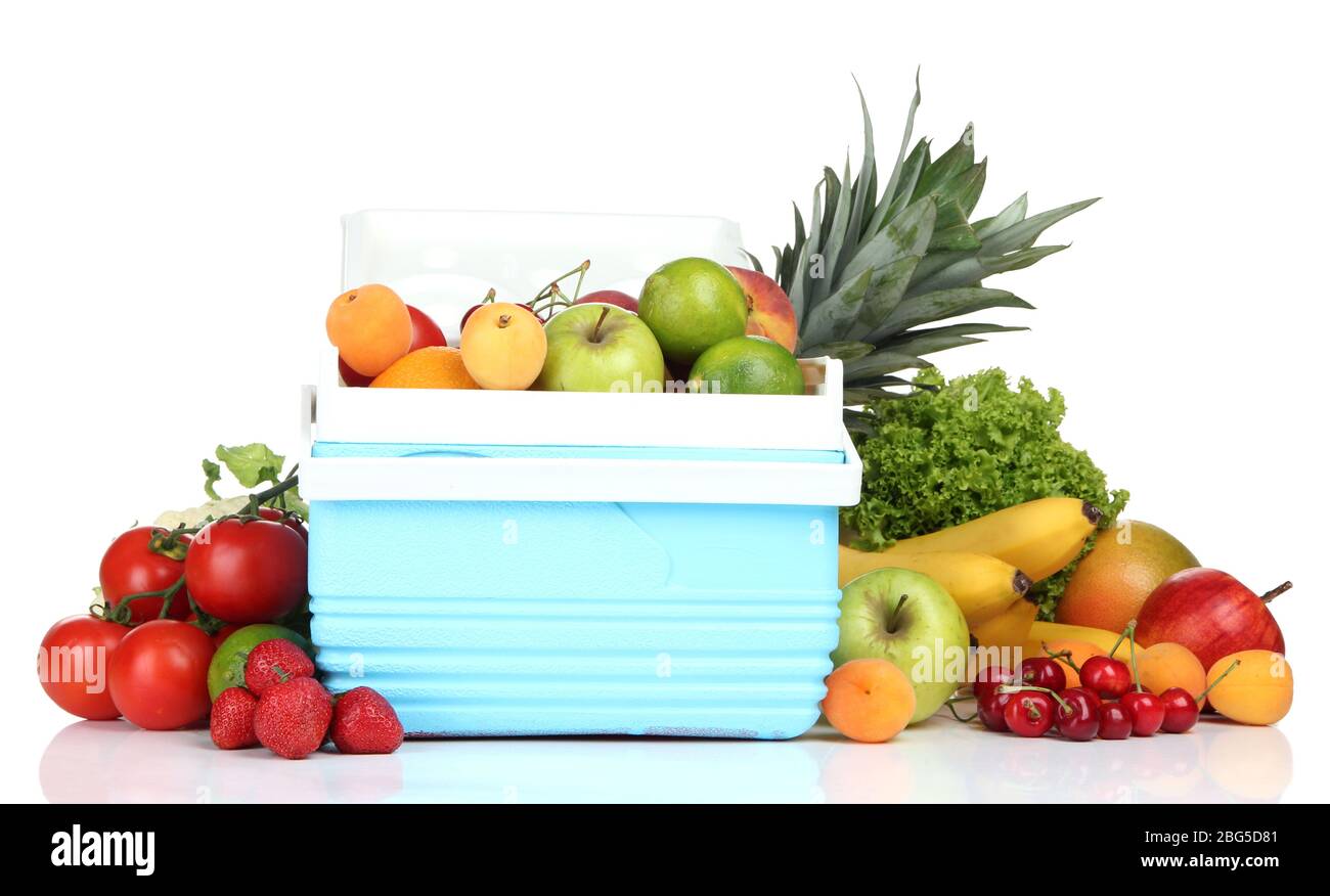 Fresh fruits and vegetables in mini refrigerator, isolated on white ...