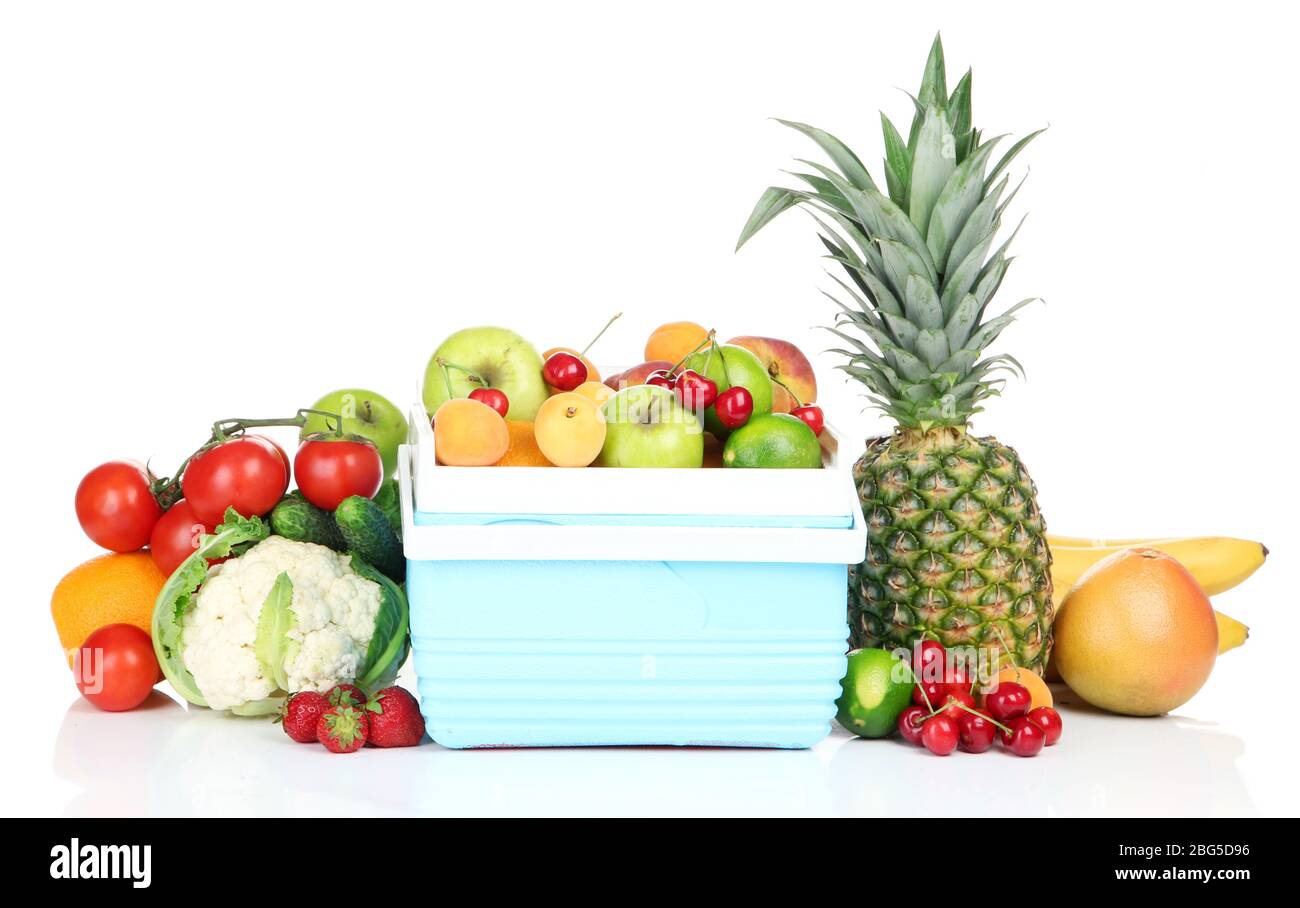 Fresh fruits and vegetables in mini refrigerator, isolated on white ...